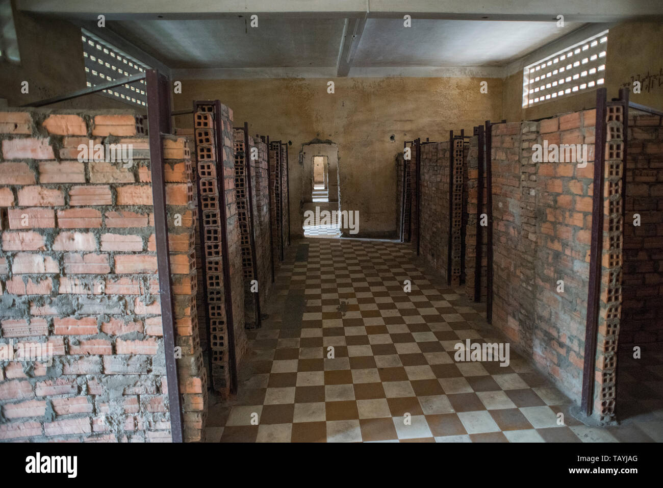 Concentration camp cells at the S-21 Tuol Sleng Genocide Museum, Phnom ...