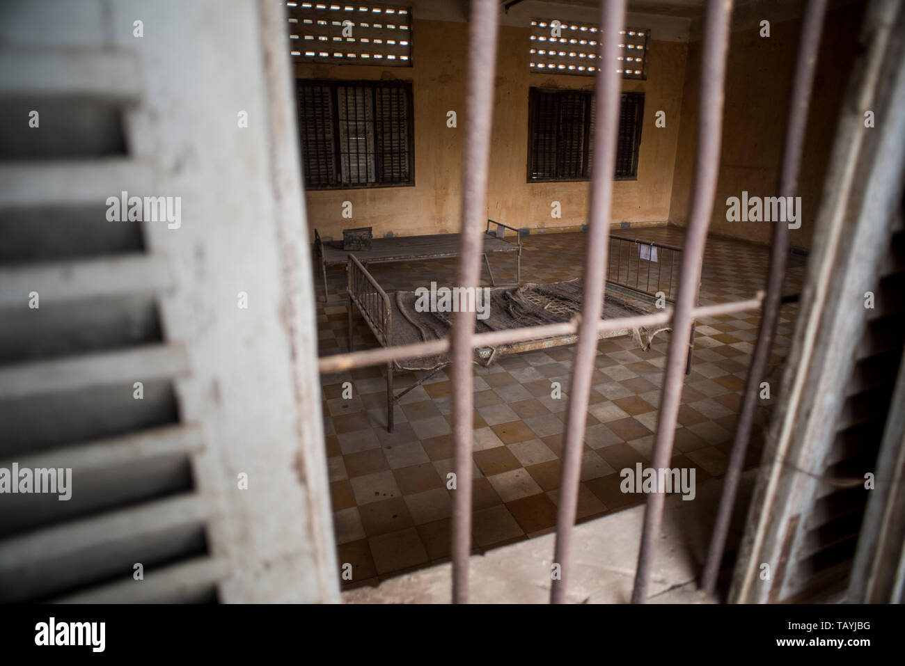 A torture cell room at the S-21 Tuol Sleng Genocide Museum, Phnom Penh ...