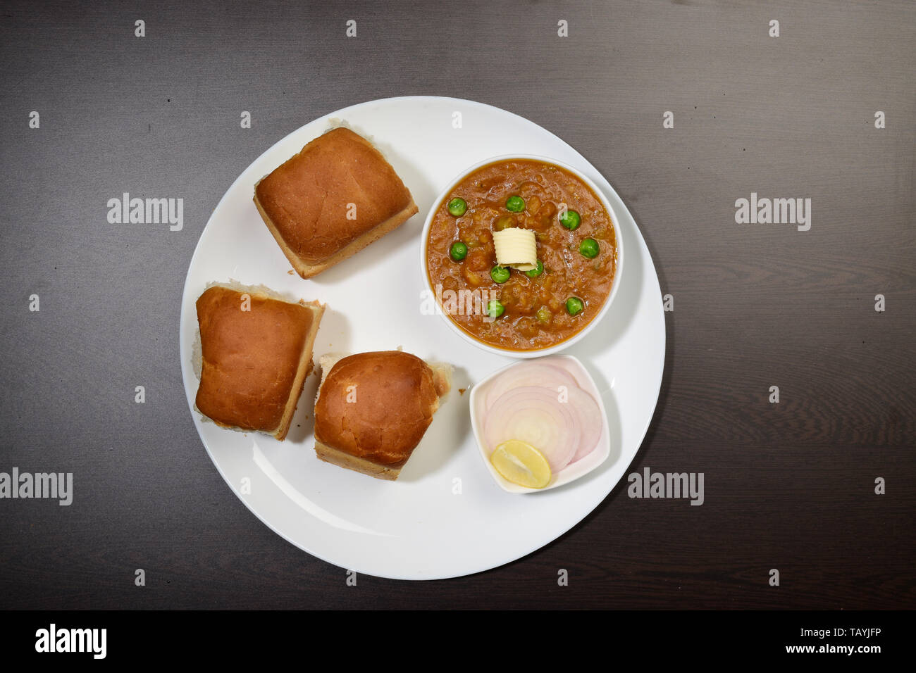 Pav Bhaji is a fast food dish from India, Thick and spicy vegetable ...