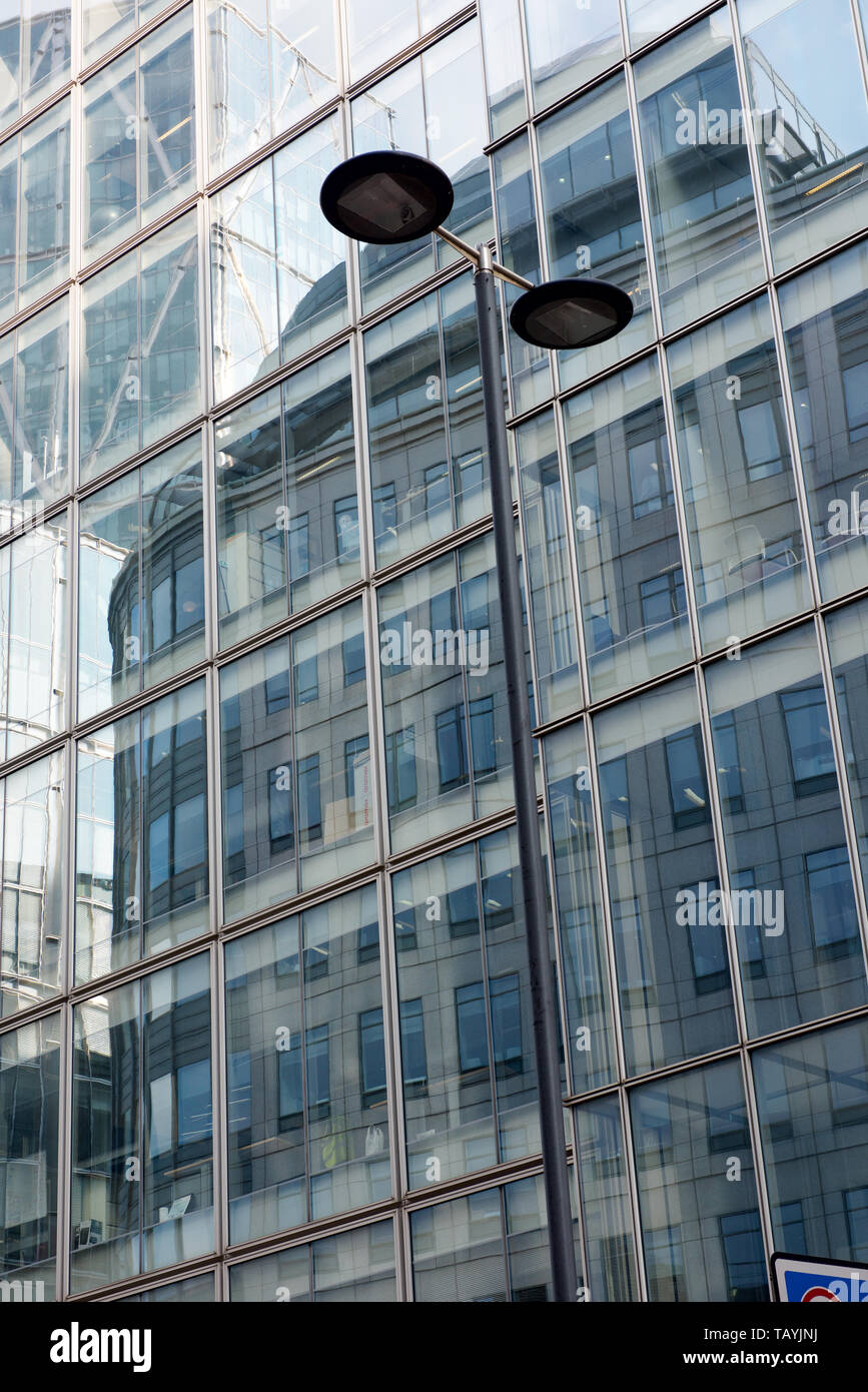 Reflection in office block windows Stock Photo - Alamy