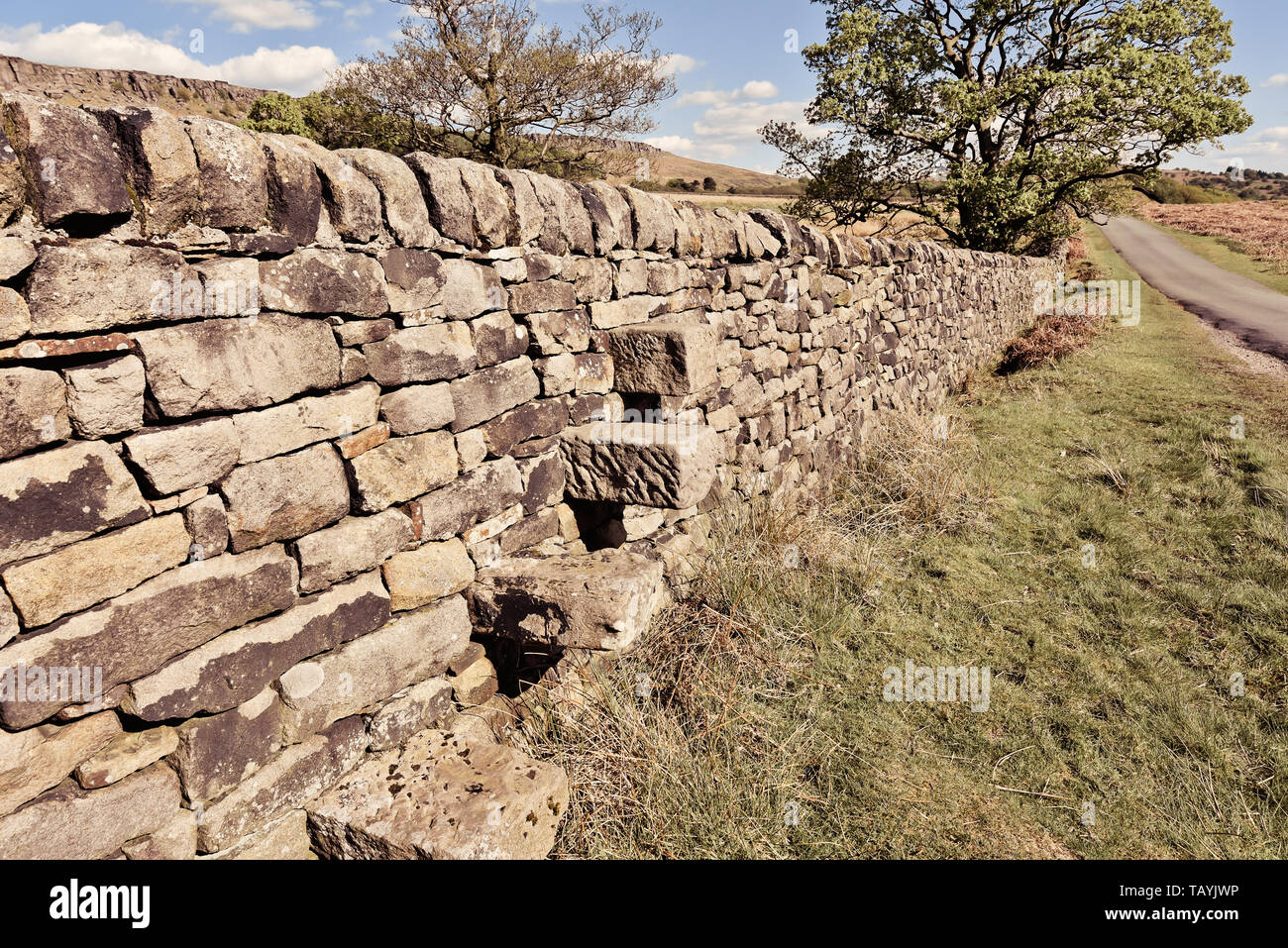 Stone wall with stile in the North Yorkshire in the United Kingdom ...