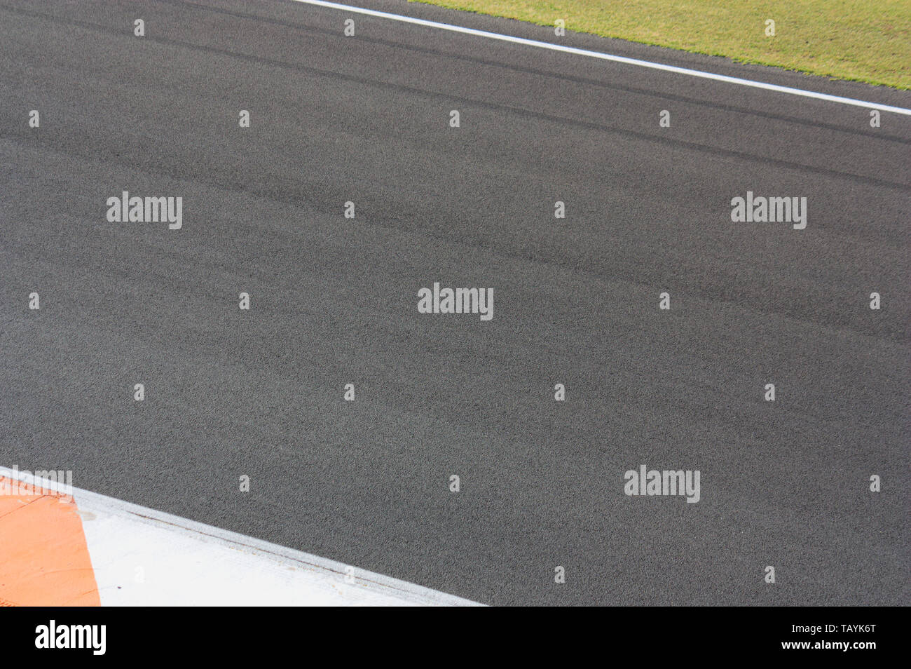 Image of a stretch of paved road with brightly colored margins Stock ...