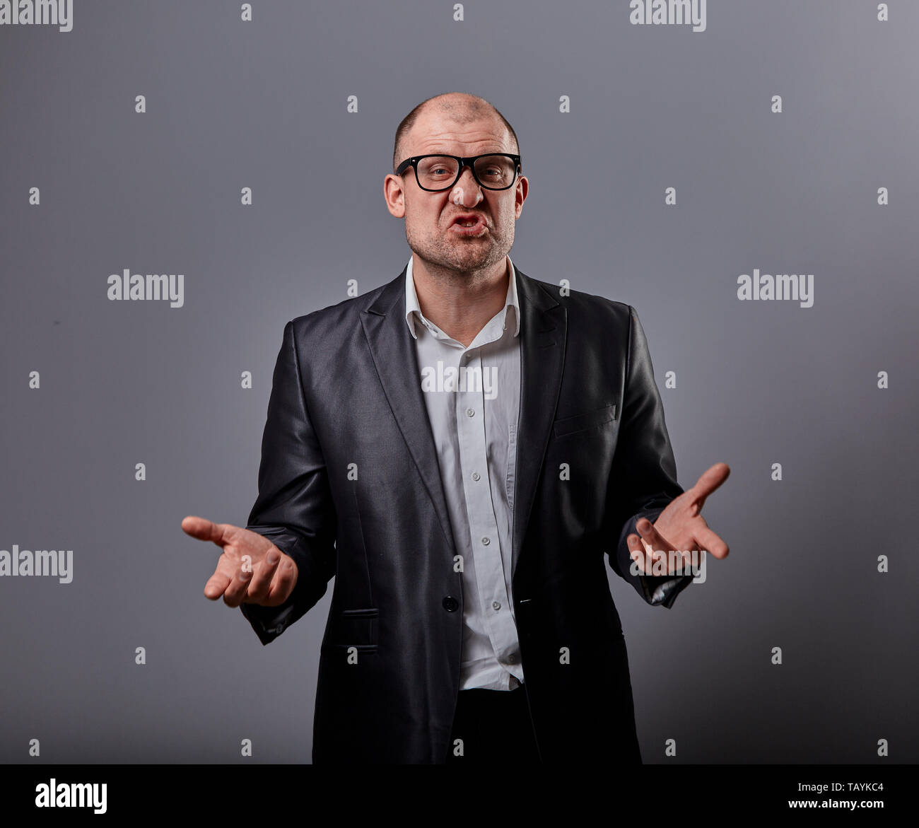 Unhappy loud crying business man talking with grimace angry face in ...