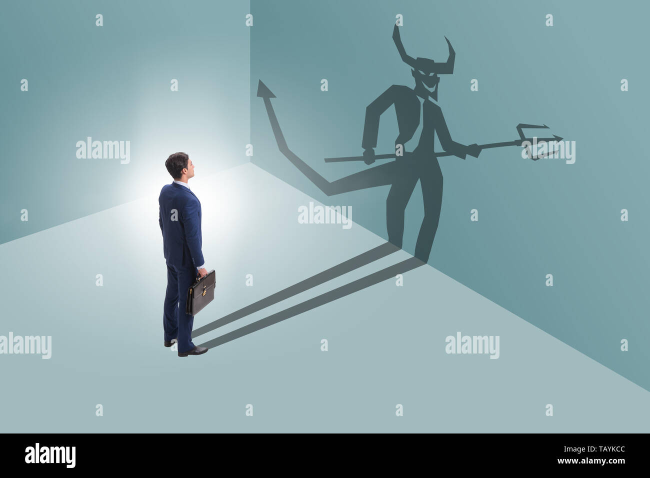Devil hiding in the businessman - alter ego concept Stock Photo - Alamy
