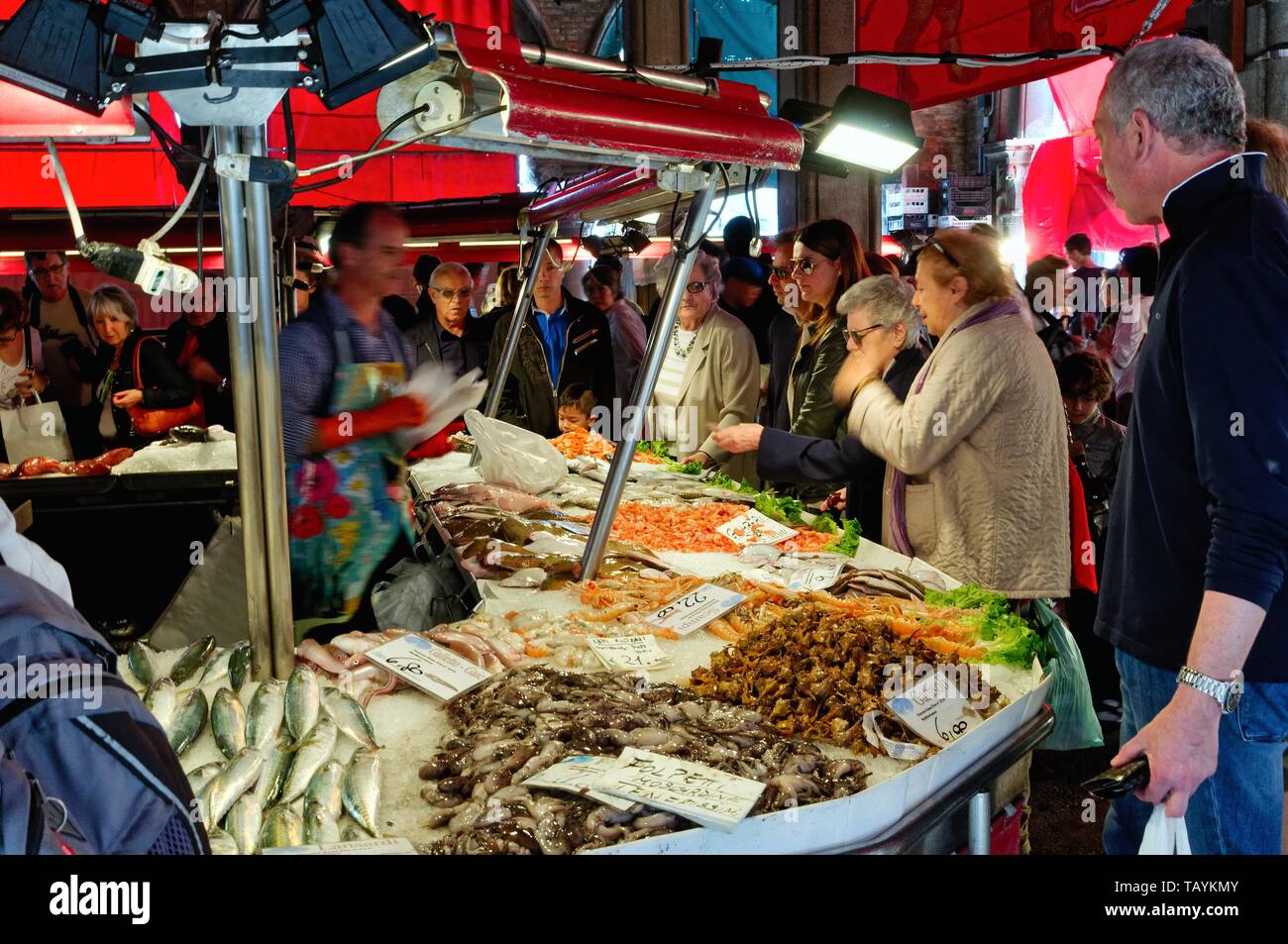 The indoor fish market in Venice crowded with customers, Italy Europe ...