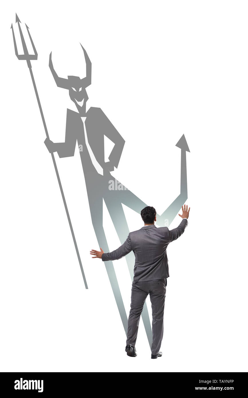 Devil hiding in the businessman - alter ego concept Stock Photo - Alamy