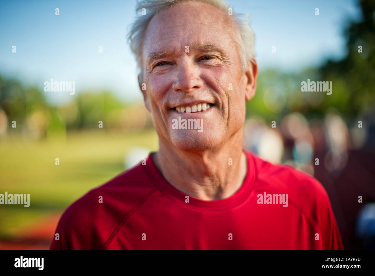 Portrait of a smiling senior man Stock Photo - Alamy