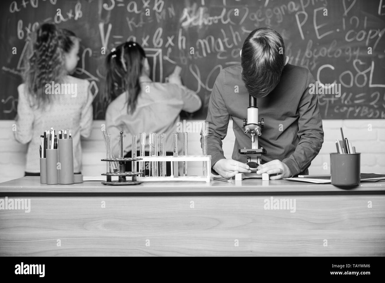 Little kids learning chemistry in lab. Chemistry equipment. Happy ...