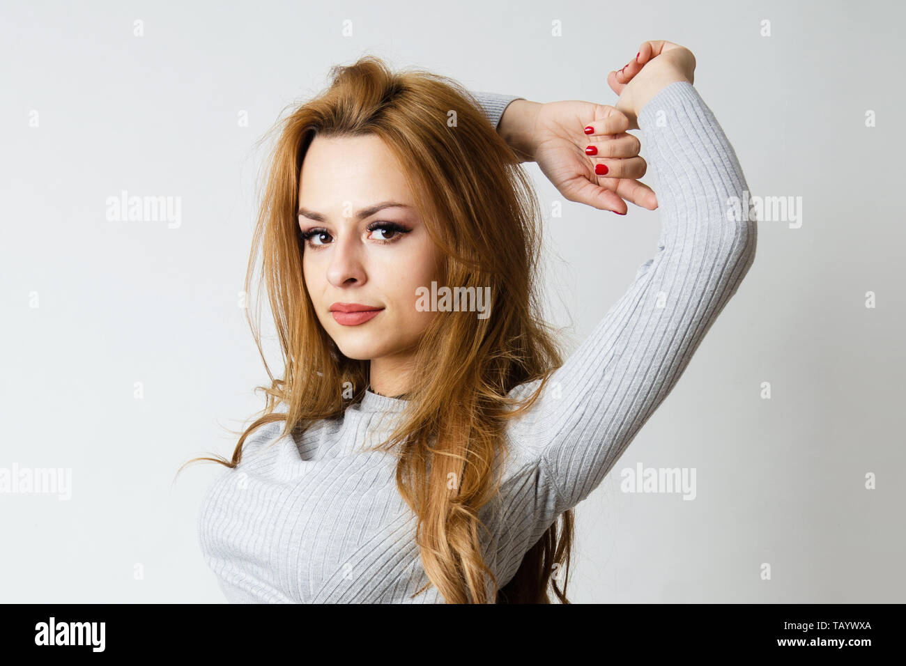 Shapely girl from Poland. Young female model posing in studio with ...