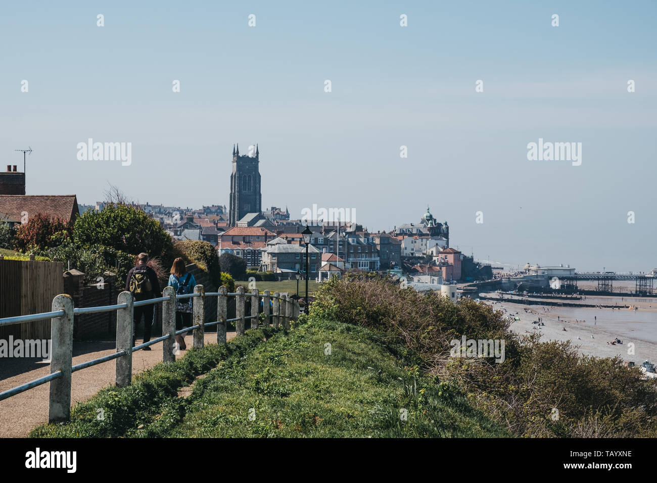 Cromer, UK-April 20, 2019: People walking on a coastal path alongside ...