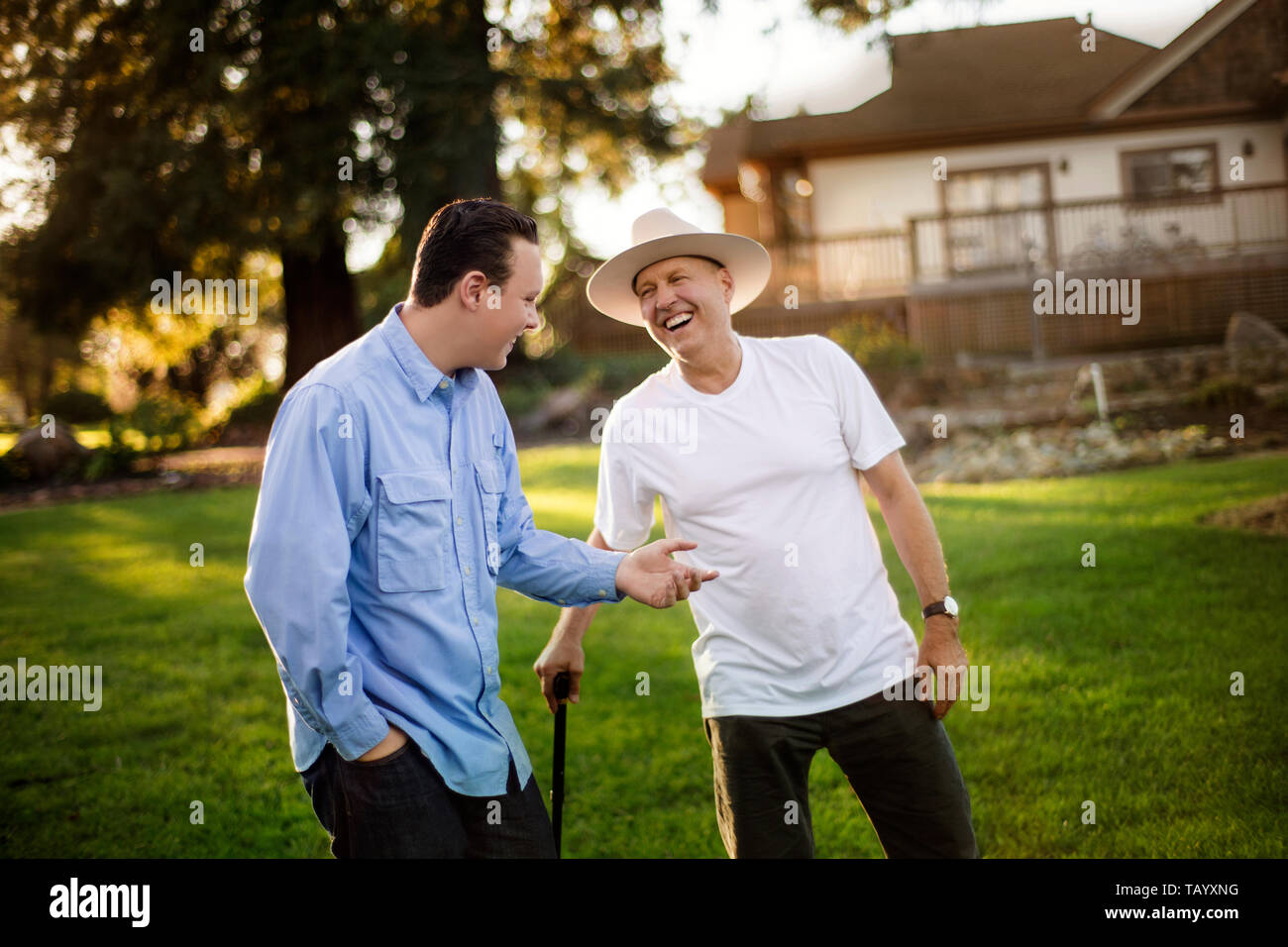 Laughing with their dad hi-res stock photography and images - Alamy