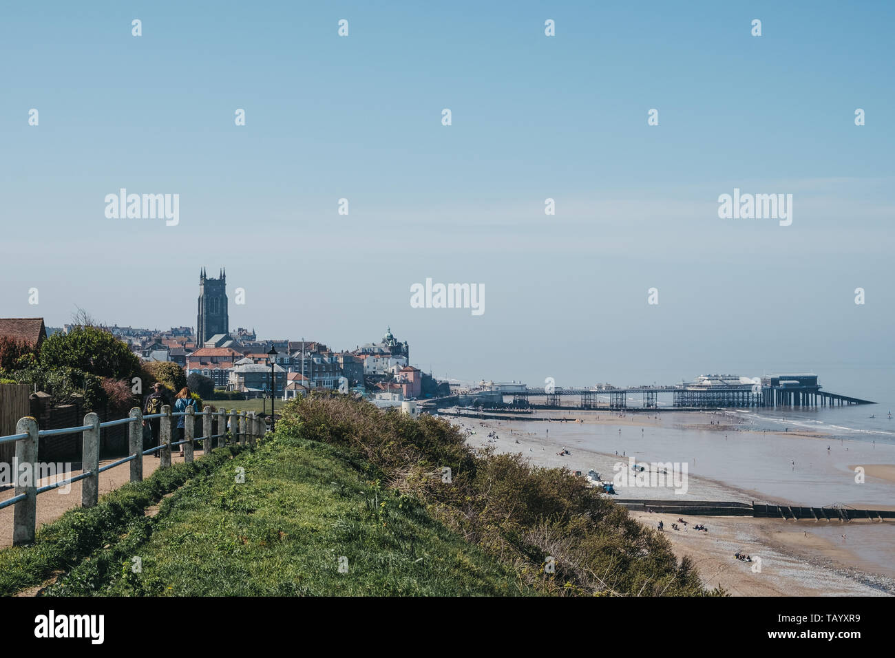 Cromer, UK-April 20, 2019: People walking on a coastal path alongside ...