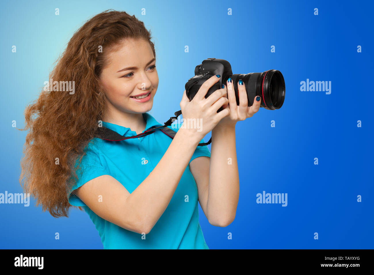 Woman photographer with camera Stock Photo - Alamy