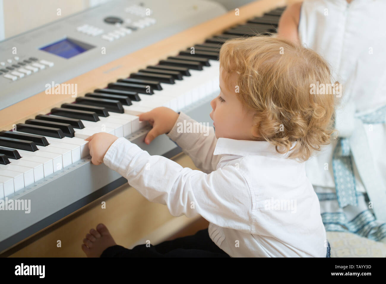 Blond school boy musical instrument hi-res stock photography and images ...