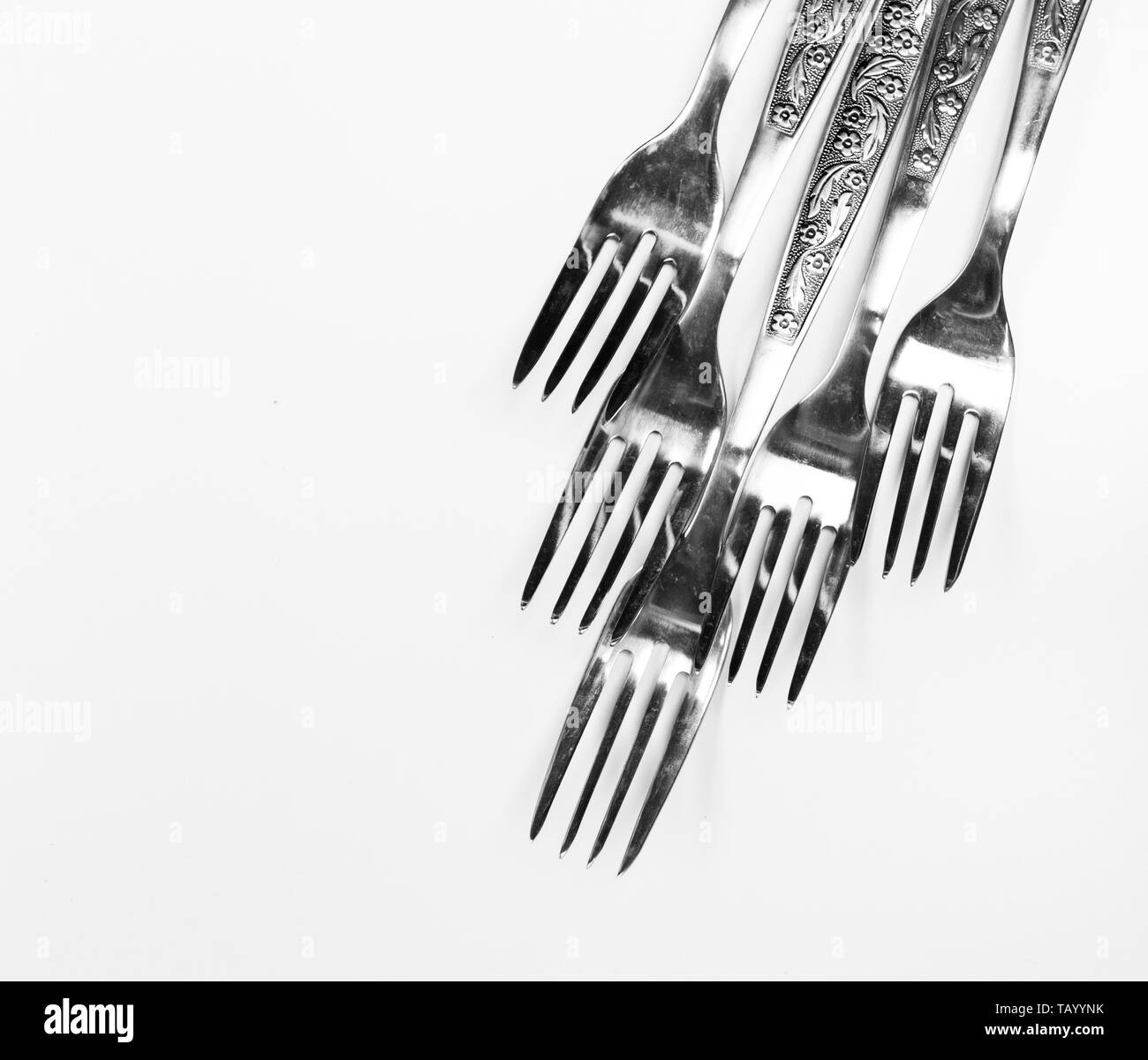 Old metal forks isolated on a white background Stock Photo - Alamy