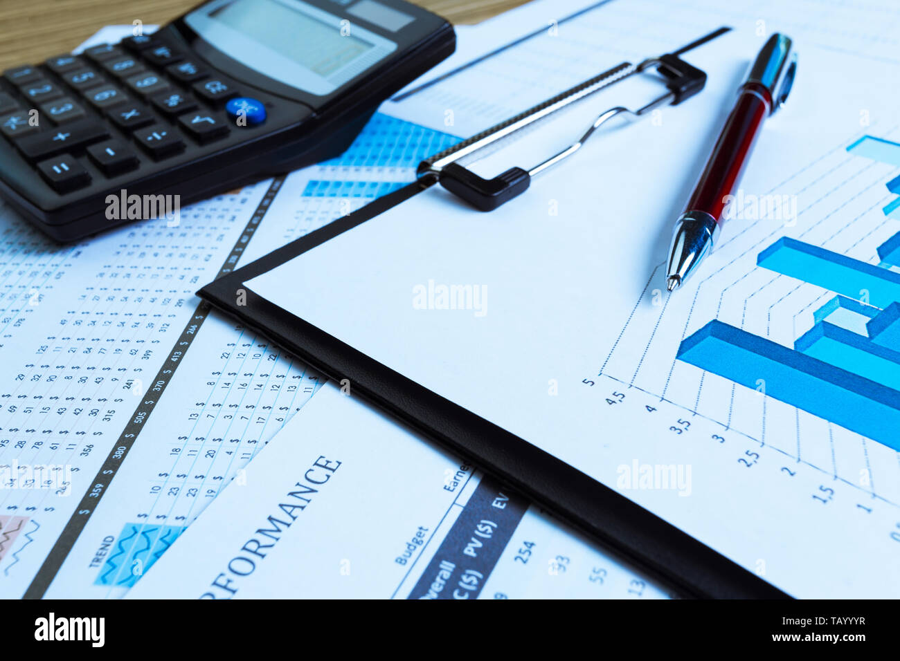 Graphs and Calculator Stock Photo - Alamy