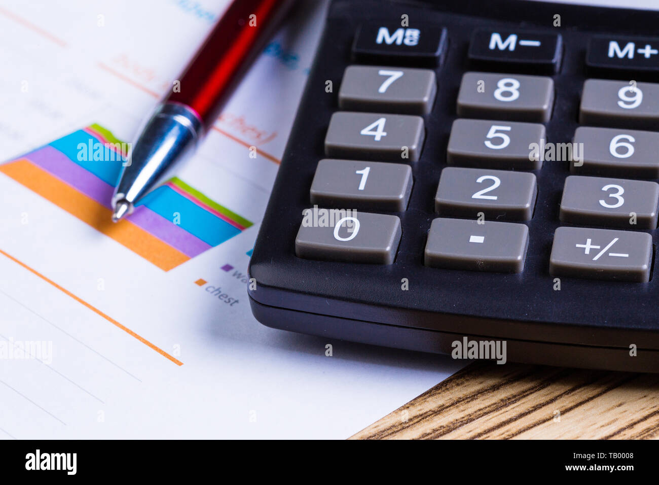 Graphs and Calculator Stock Photo - Alamy