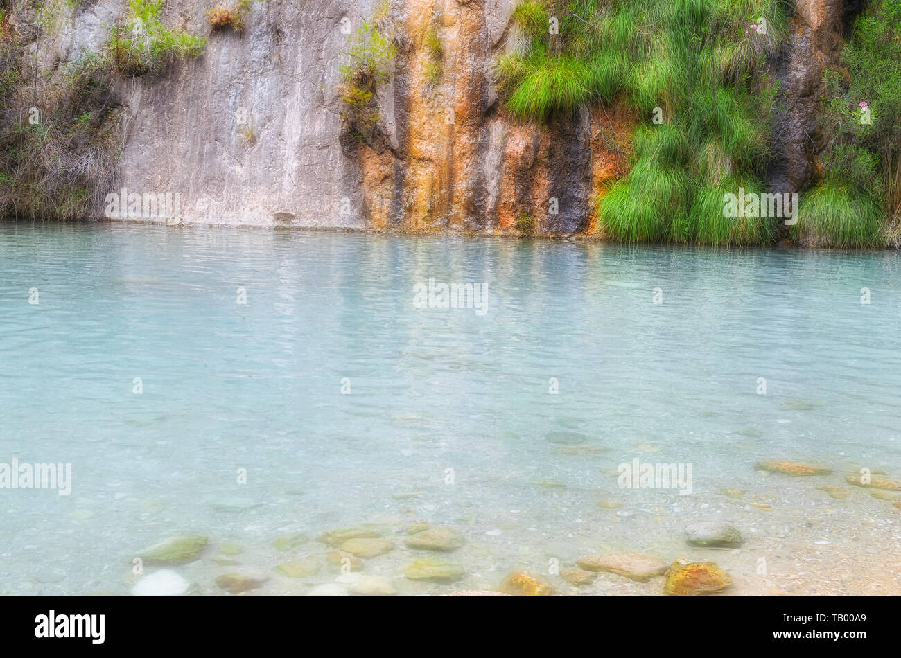 HDR color. Riverside of Mijares. River with thermal waters at the ...