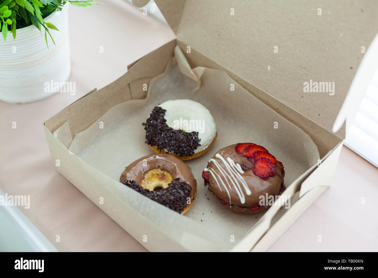 Colorful donuts in box Stock Photo - Alamy