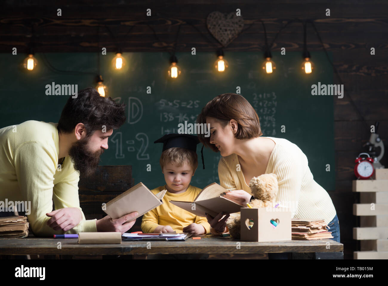 Knowledge concept. Little child learn reading books, knowledge ...