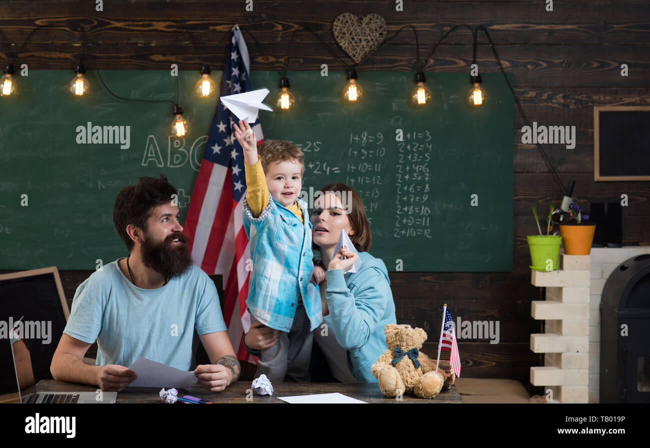 Freedom concept. Little child and parents with paper plane, freedom ...