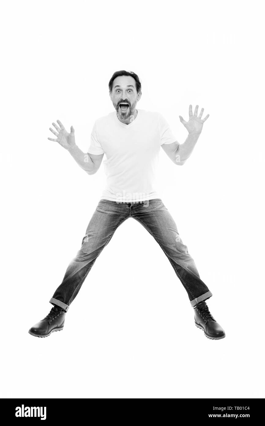 Man excited jumping. Mature charismatic speaker excited to inform. Full ...