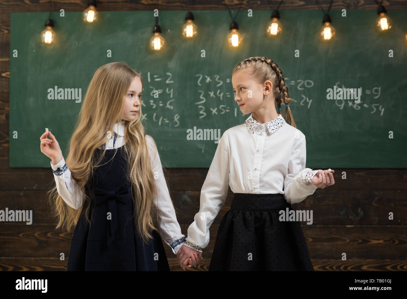 back to school. happy small girls back to school back to school concept ...