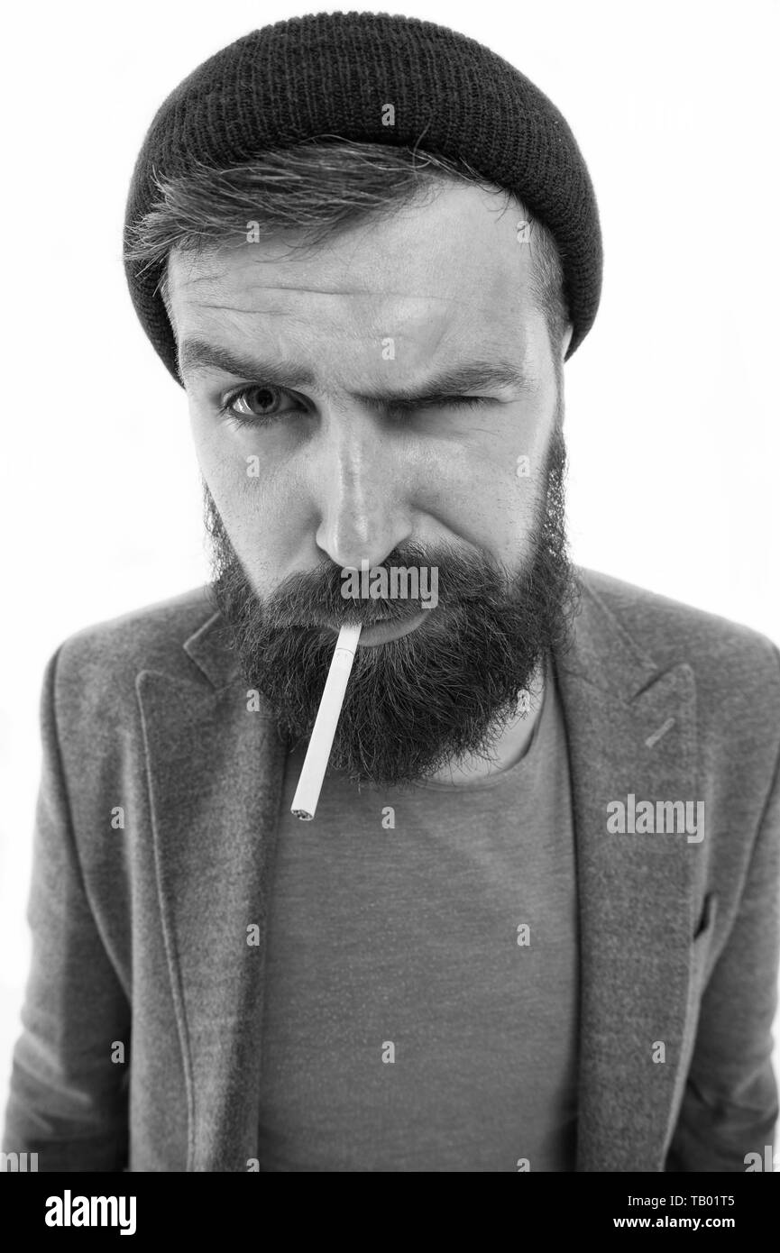 Brutal habits and lifestyle of tramp. Hipster brutal bearded tobacco ...