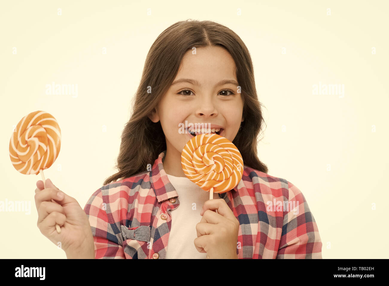 Impressing fact sugar nutrition. Girl child smiling holds lollipop ...
