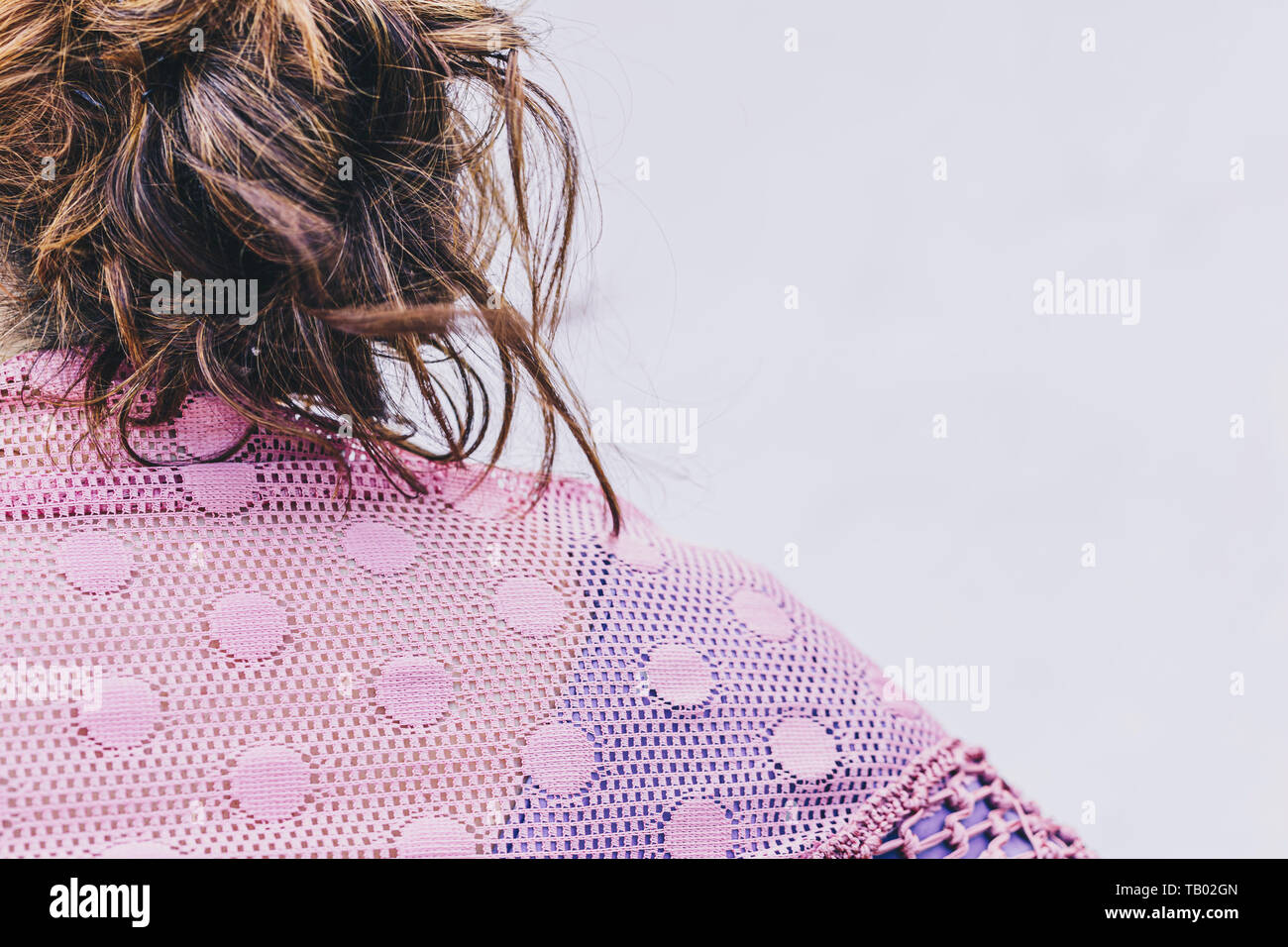 Handmade shawl on back of woman with white background for copy, copy ...