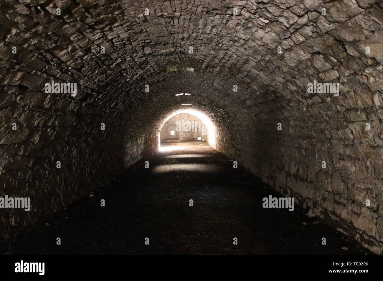 ancient dark secret passage of a castle Stock Photo - Alamy