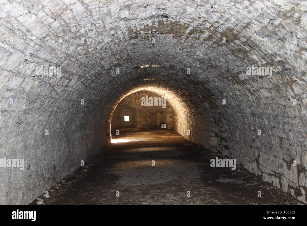ancient dark secret passage of a castle Stock Photo - Alamy