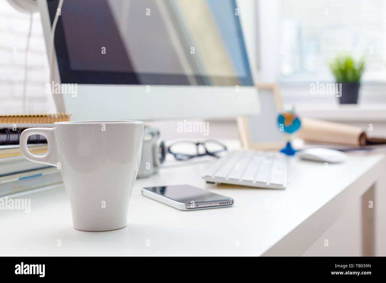 working table with computer Stock Photo - Alamy