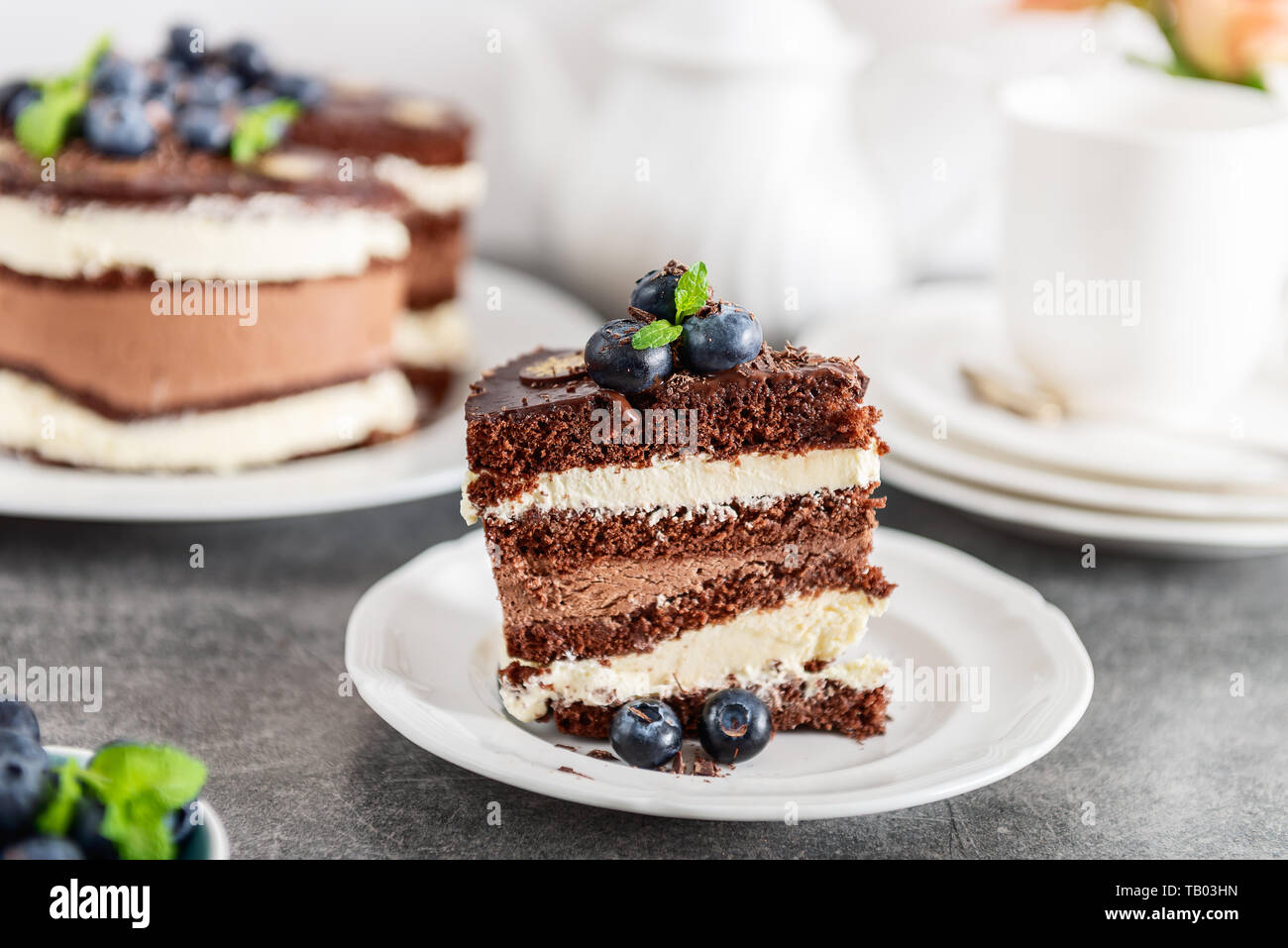 Belgian Chocolate Layered Gateau. Layers of moist choco sponge, vanilla ...