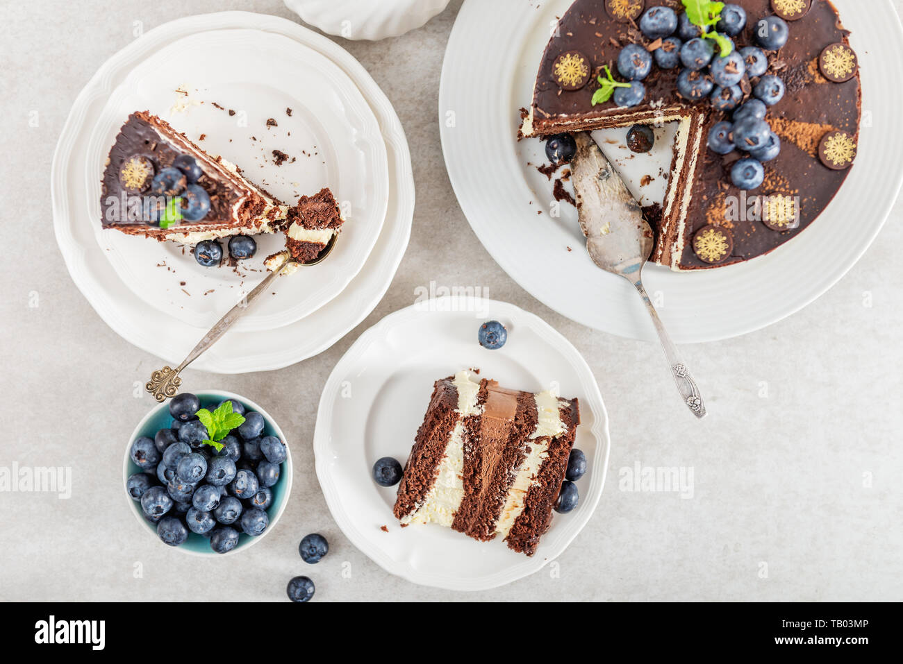 Belgian Chocolate Layered Gateau. Layers of moist choco sponge, vanilla ...