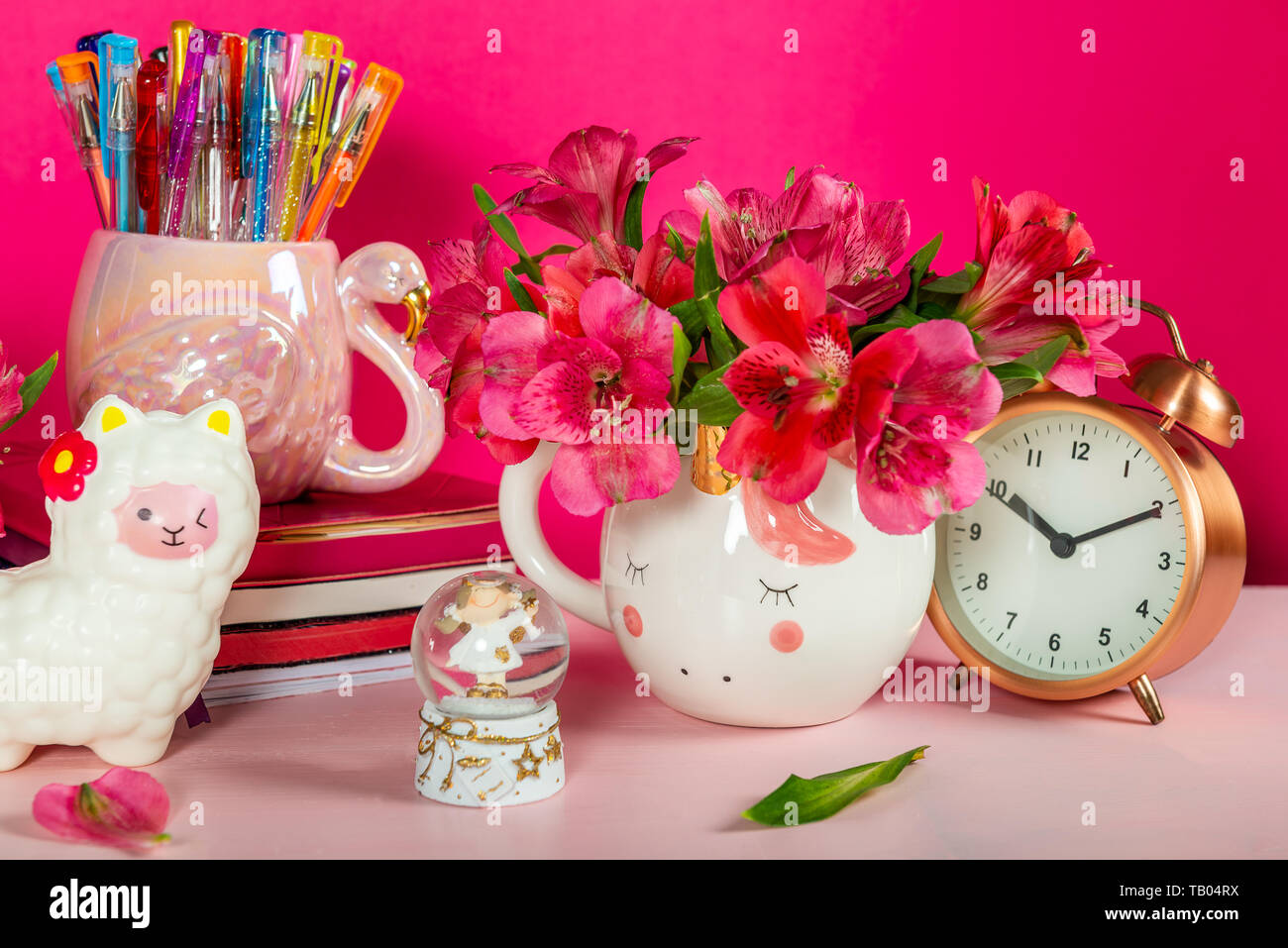 Different Notebooks, alarm clock, unicorn mug, llama squishy ...