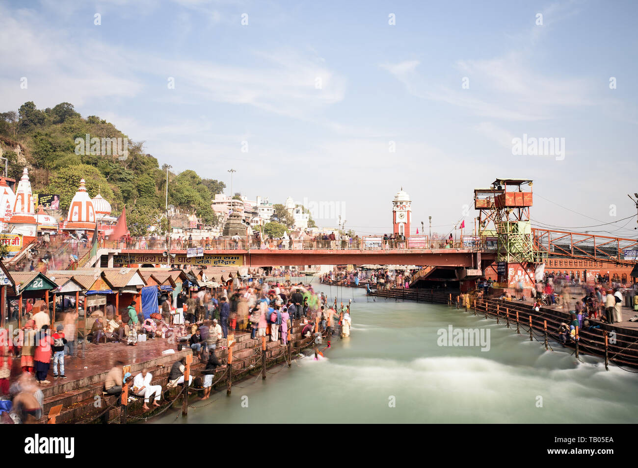Hundreds of Hindu people are doing the holy bath in the sacred Ganges ...