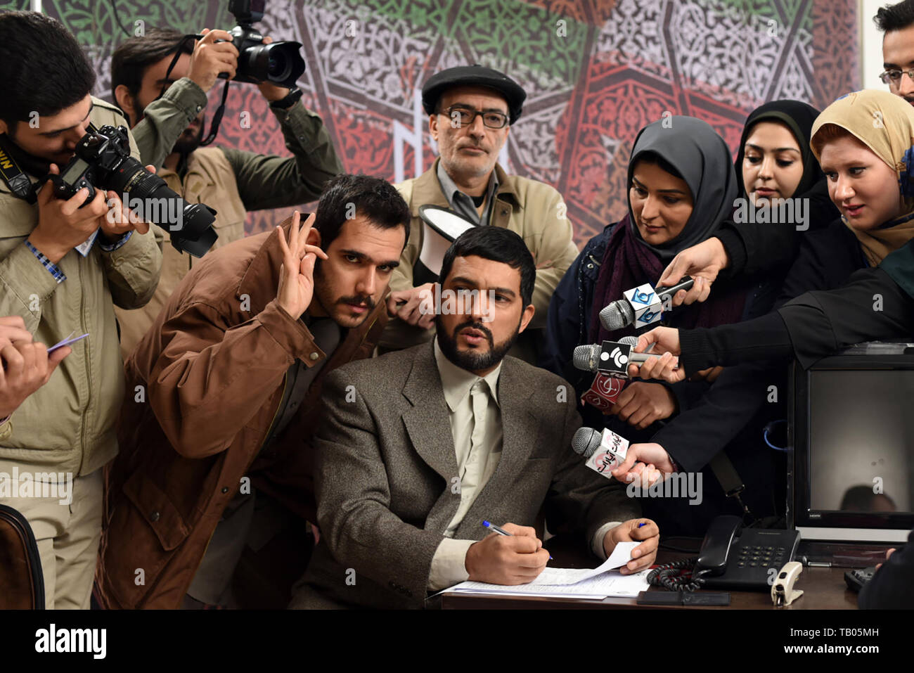 SLY, (aka MARMOOZ), seated: Hamed Behdad, 2018. © Daricheh Cinema ...