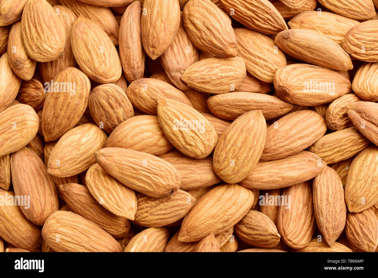 Organic texture of almonds. View from above.badam. Almonds macro ...