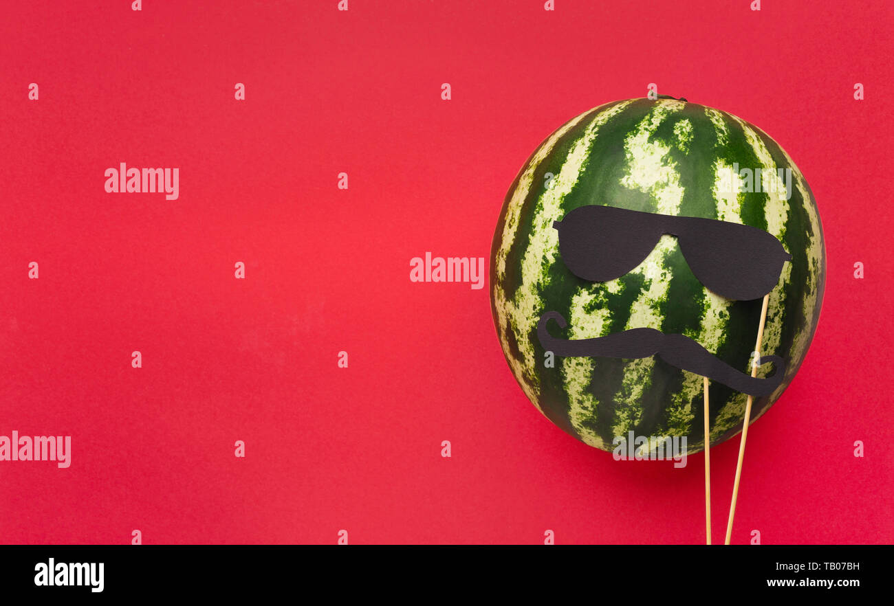 Striped watermelon with sunglasses and moustache photo props Stock ...