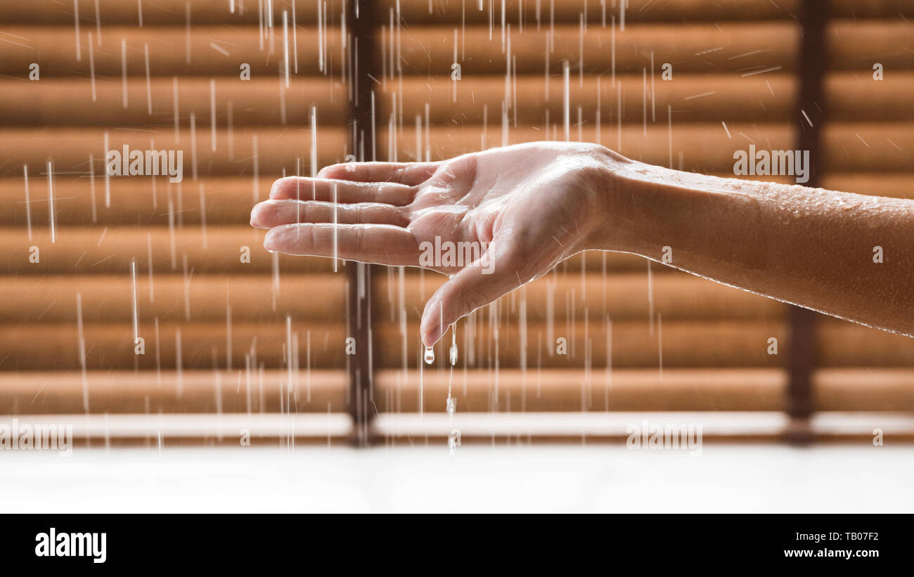 Water Drops Falling On Female Hands In Shower Stock Photo - Alamy