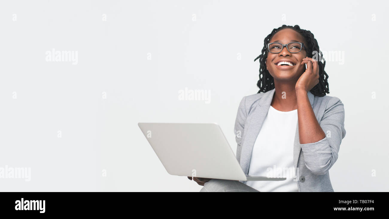 African-American Businesswoman Having Phone Talk, Grey Background Stock ...