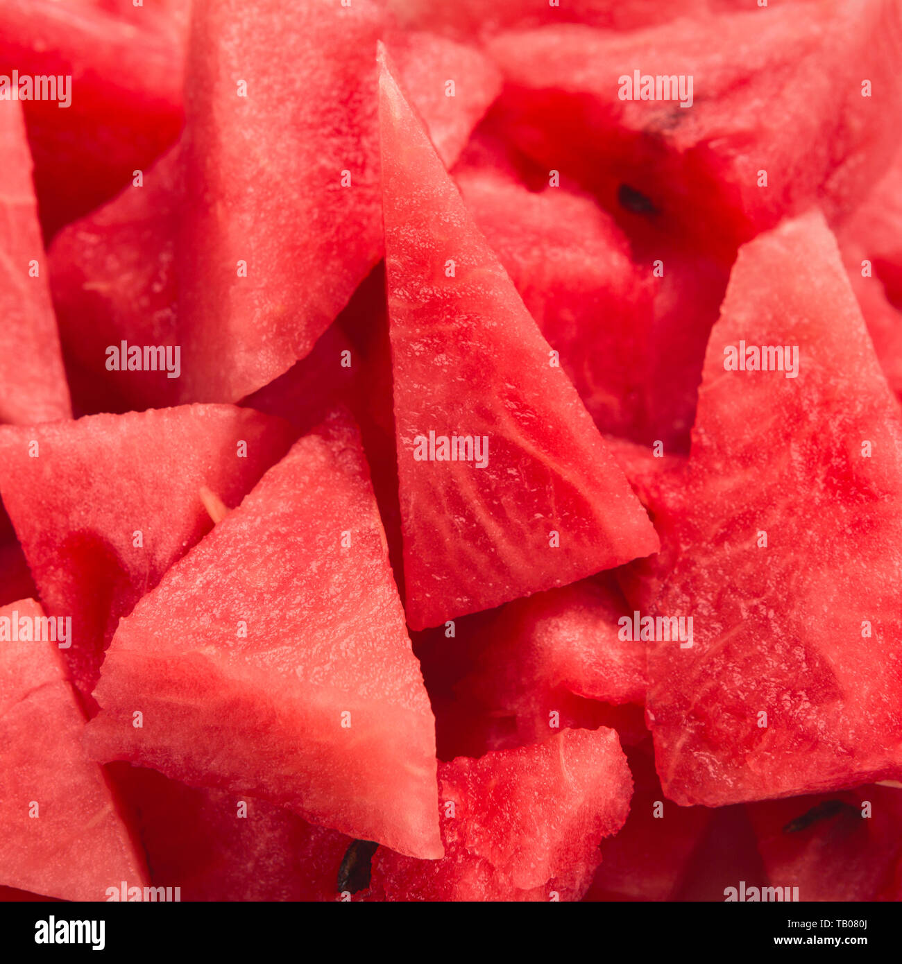 Fresh red watermelon pieces closeup, summer background Stock Photo - Alamy