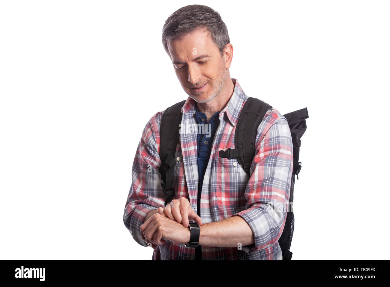 Middle-aged man or senior citizen checking heart rate pulse with health ...