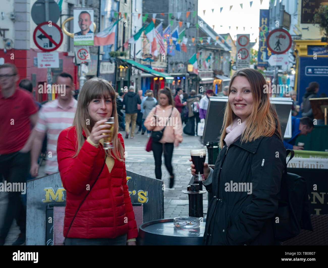 Young people drink Guiness and Cider in the streets of Galway - GALWAY ...