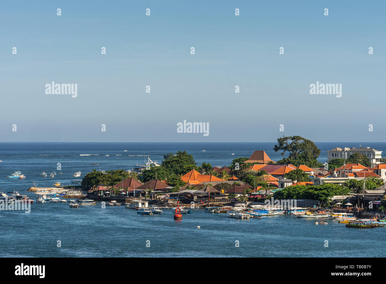 Benoa harbour, Bali, Indonesia - February 26, 2019: The red roofs of ...