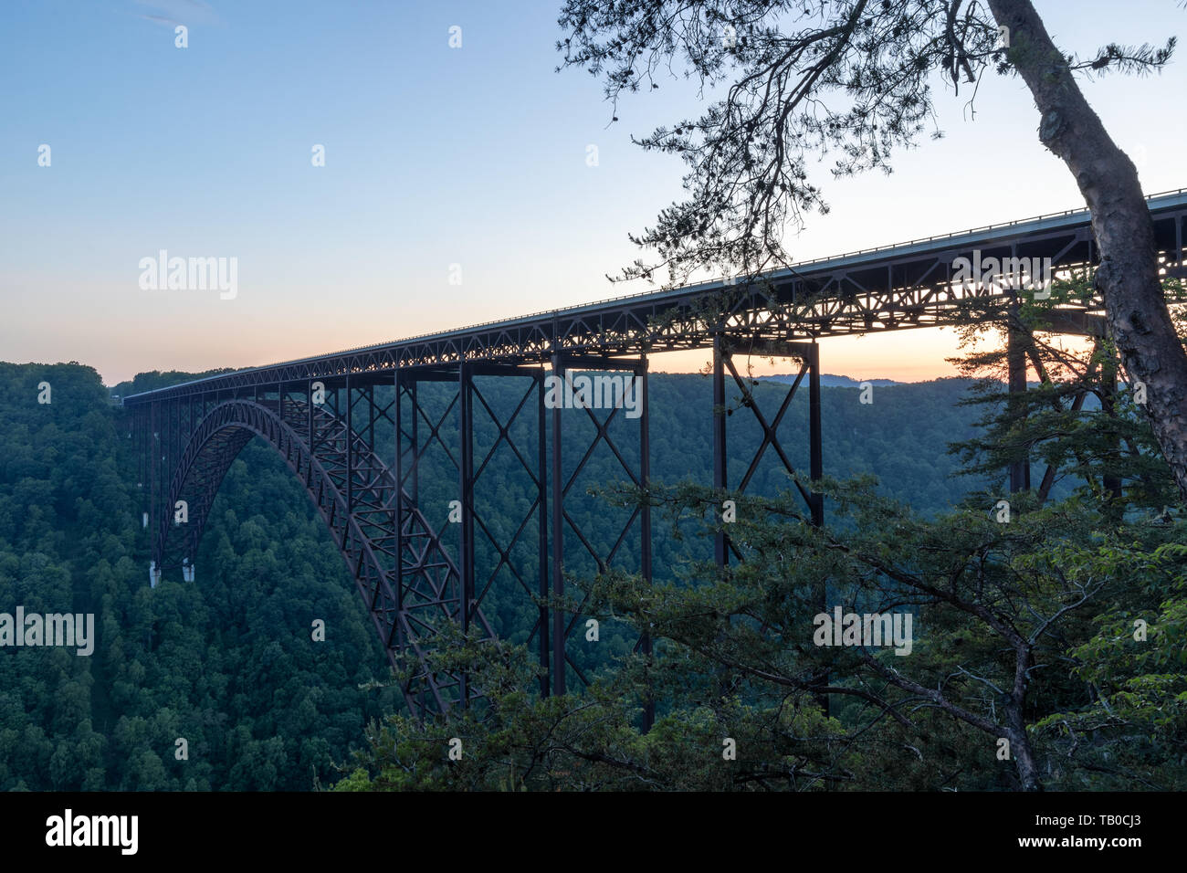 The New River Gorge Bridge at dusk, located at Victor, West Virginia ...