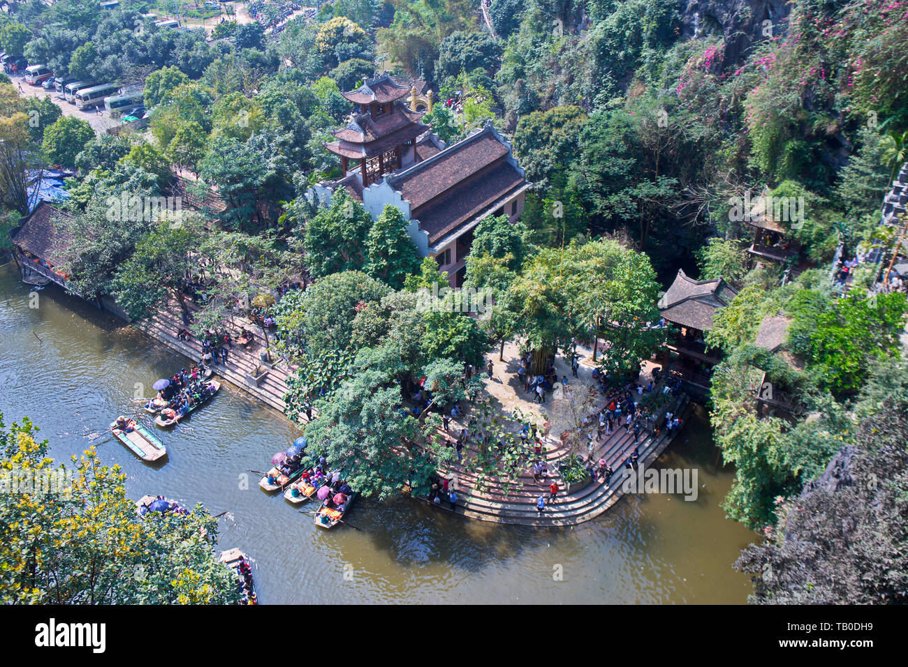 NINHBINH, VIETNAM - MAR. 4, 2018: People travelled by boat around ...