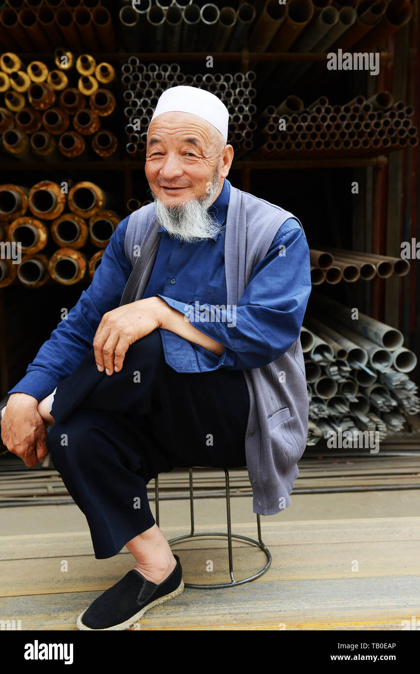 Muslim man smiling hi-res stock photography and images - Alamy