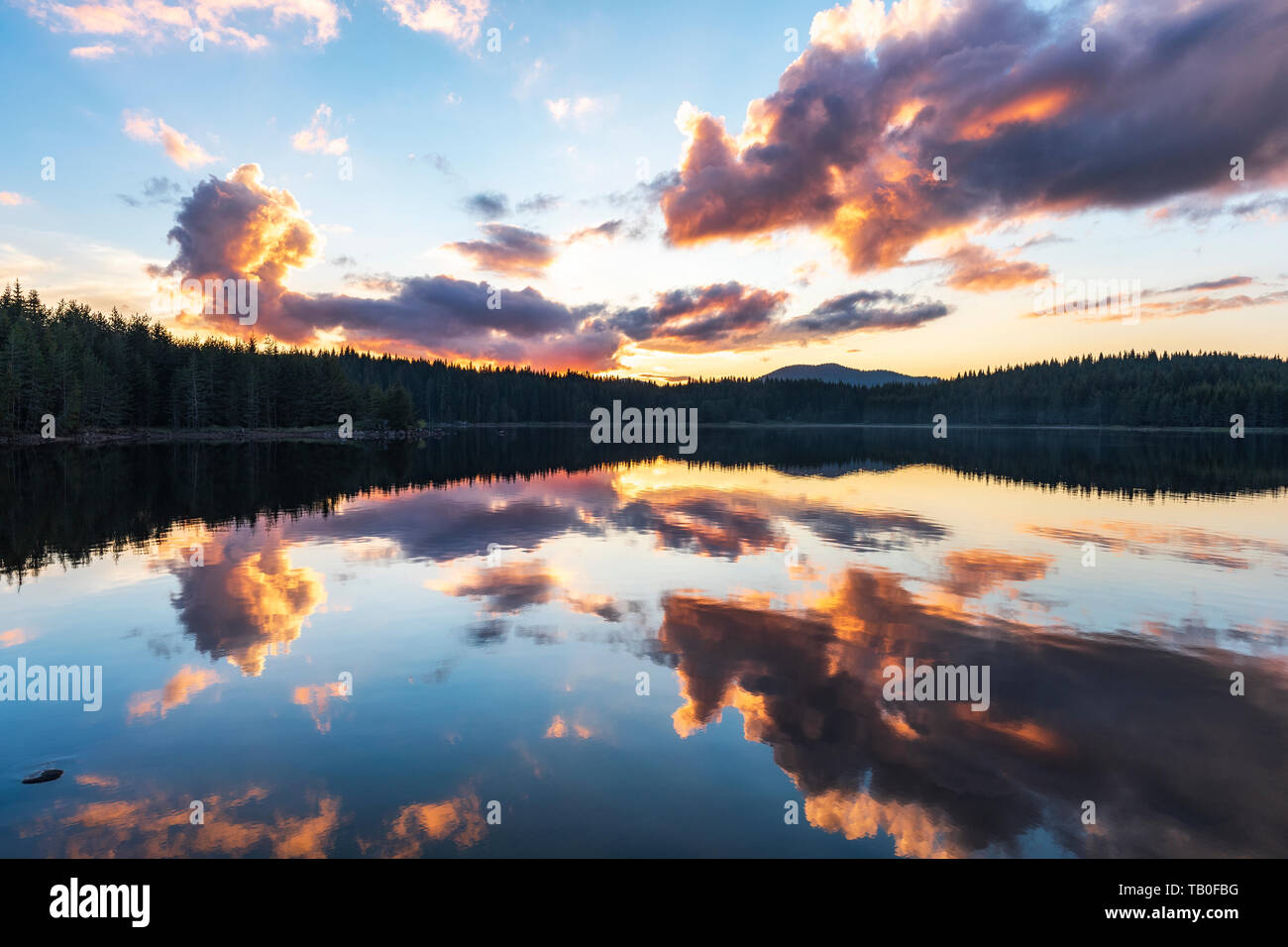 Scenic sunset over lake colorful hi-res stock photography and images ...